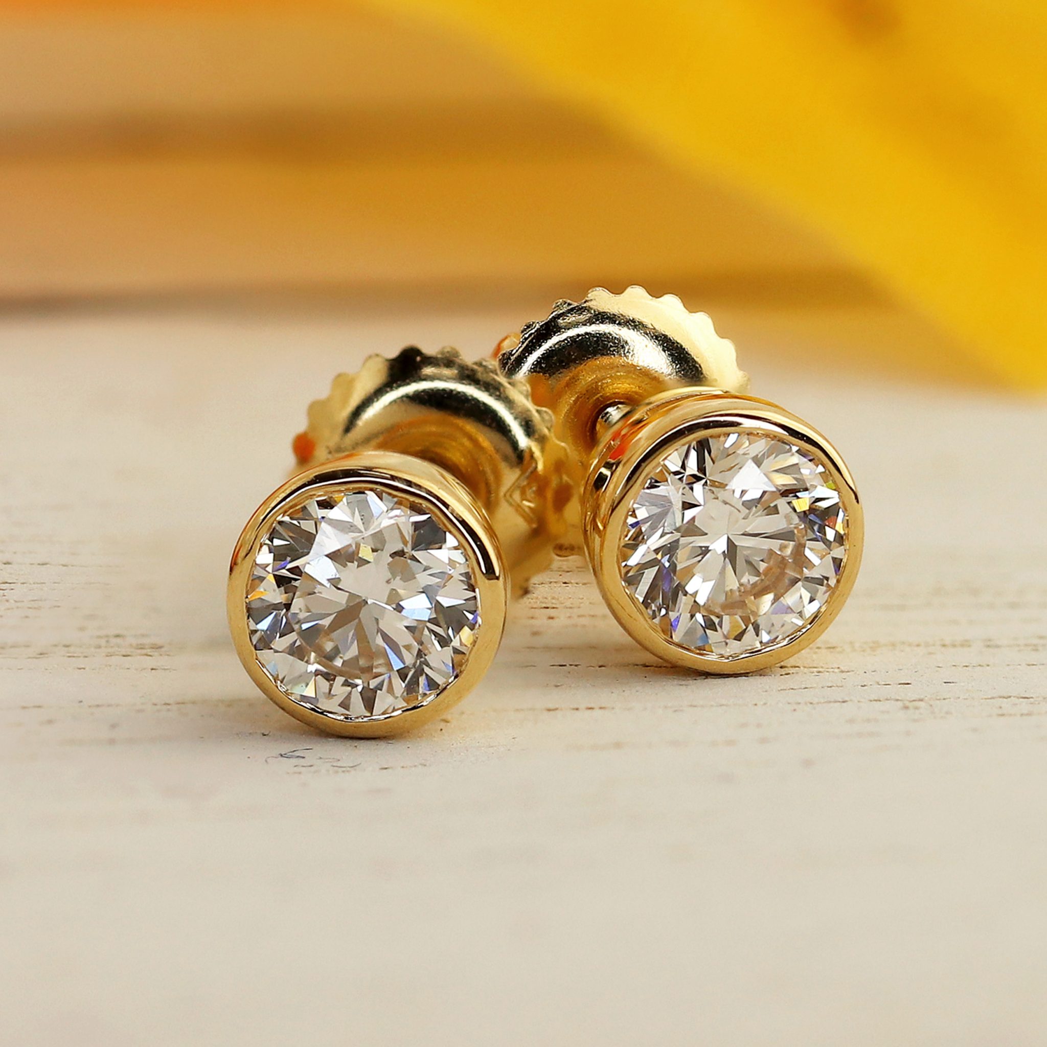 The Best Setting for Your Diamond Studs - DiamondStuds News